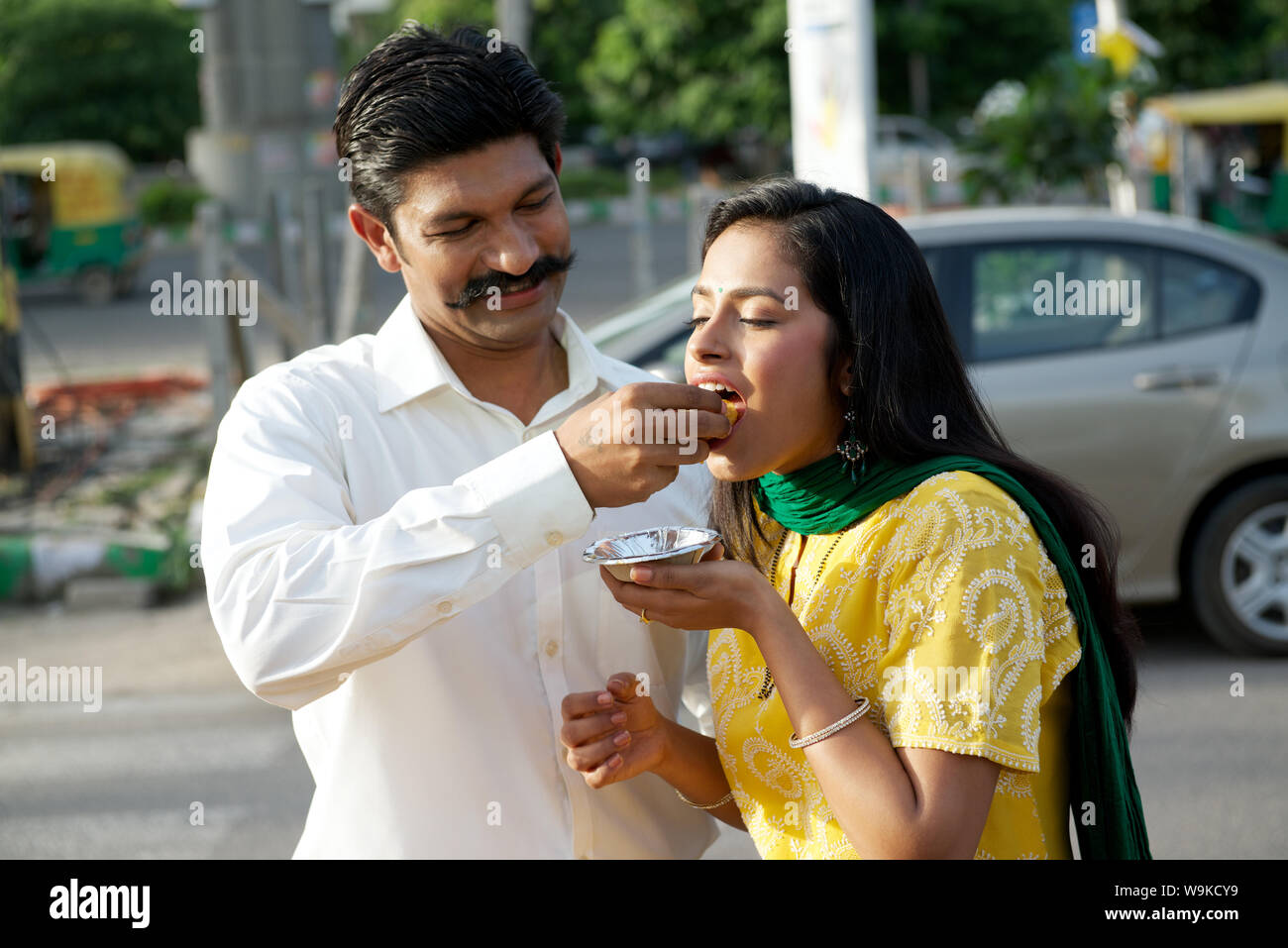 Couple eating indian snack panipuri hi-res stock photography and images ...
