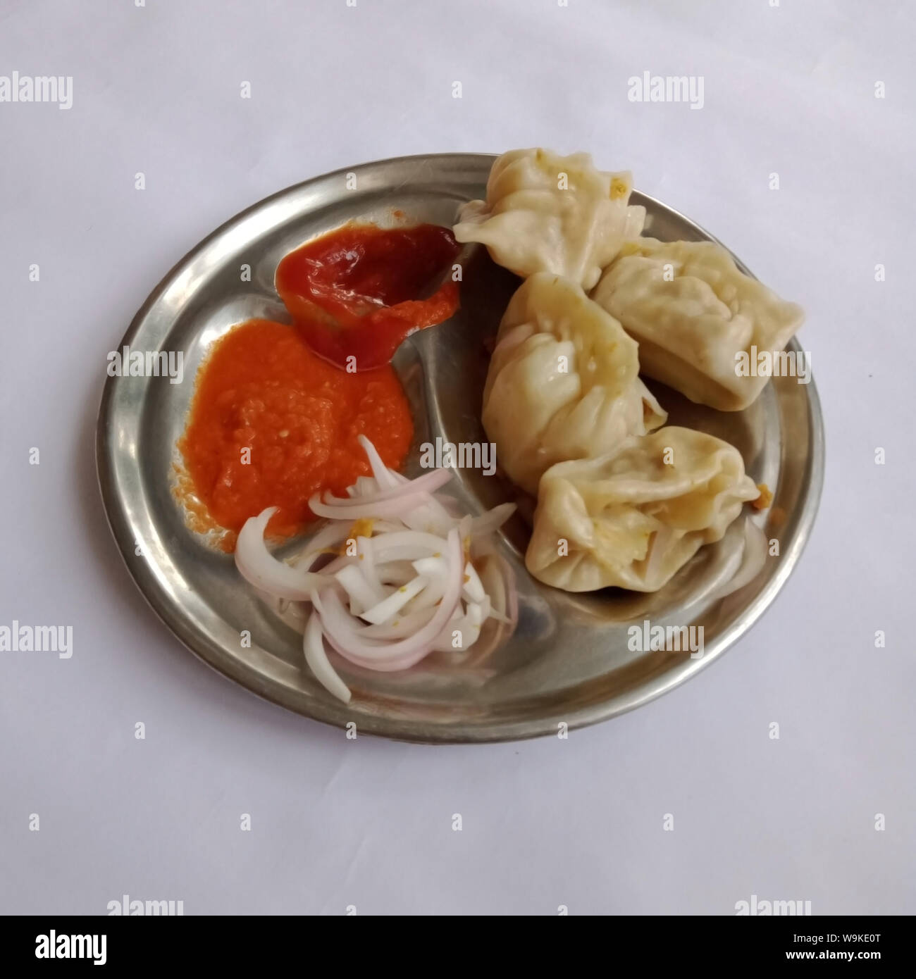 Nepal served with tomato chutney over moody background Stock Photo - Alamy