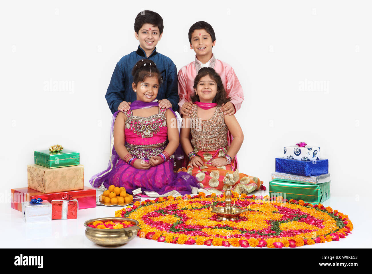Group of children celebrating Diwali and smiling Stock Photo - Alamy