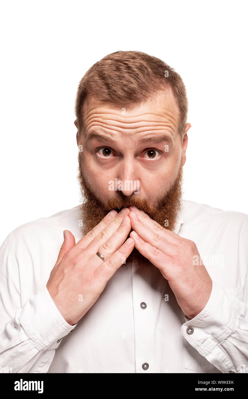 Vertical shot of stupefied stunned shocked young male keeps mouth ...