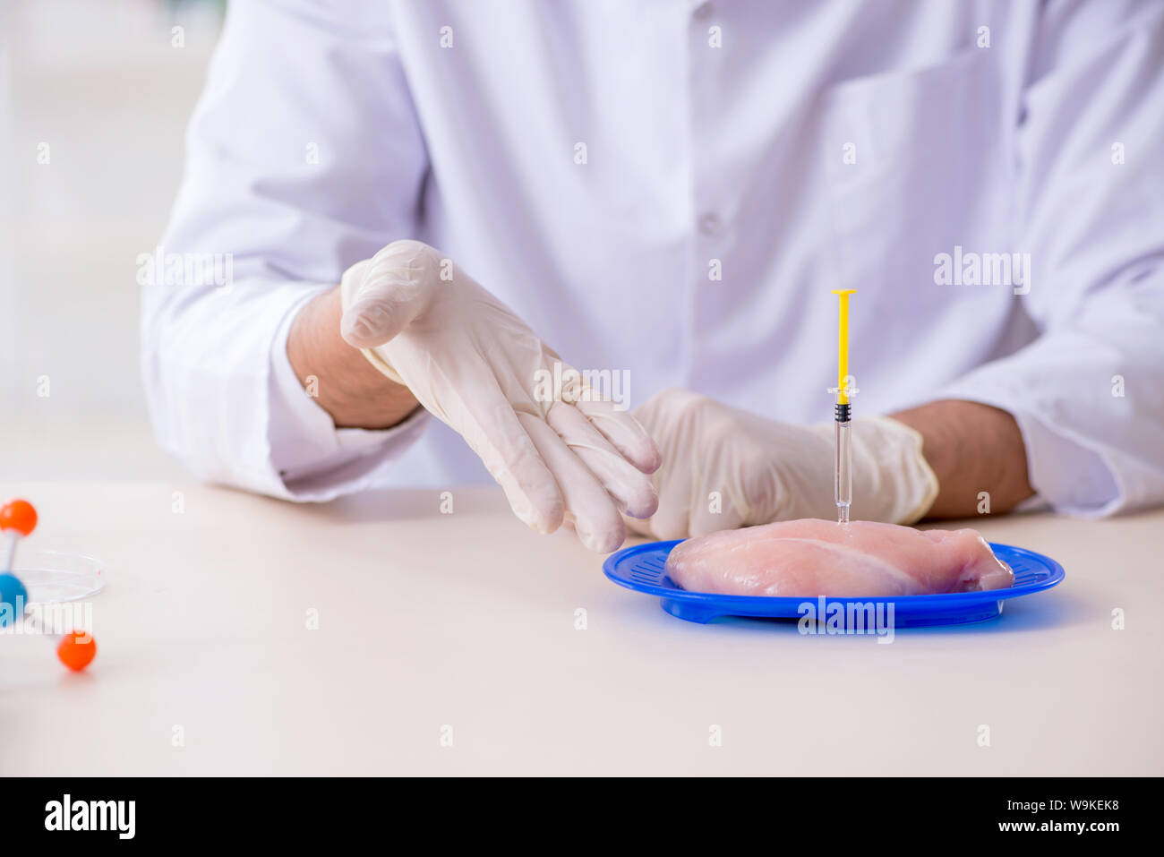 The male nutrition expert testing food products in lab Stock Photo - Alamy