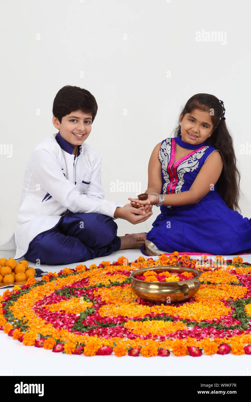 Two children celebrating Diwali Stock Photo - Alamy