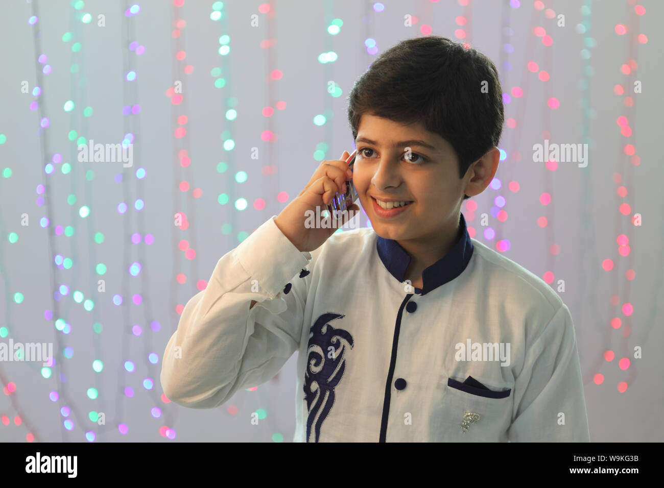 Boy talking on a mobile phone Stock Photo - Alamy