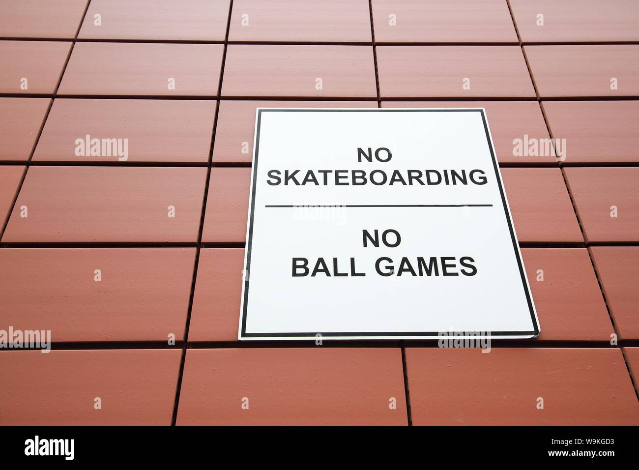 No skateboarding no ball games sign Stock Photo - Alamy