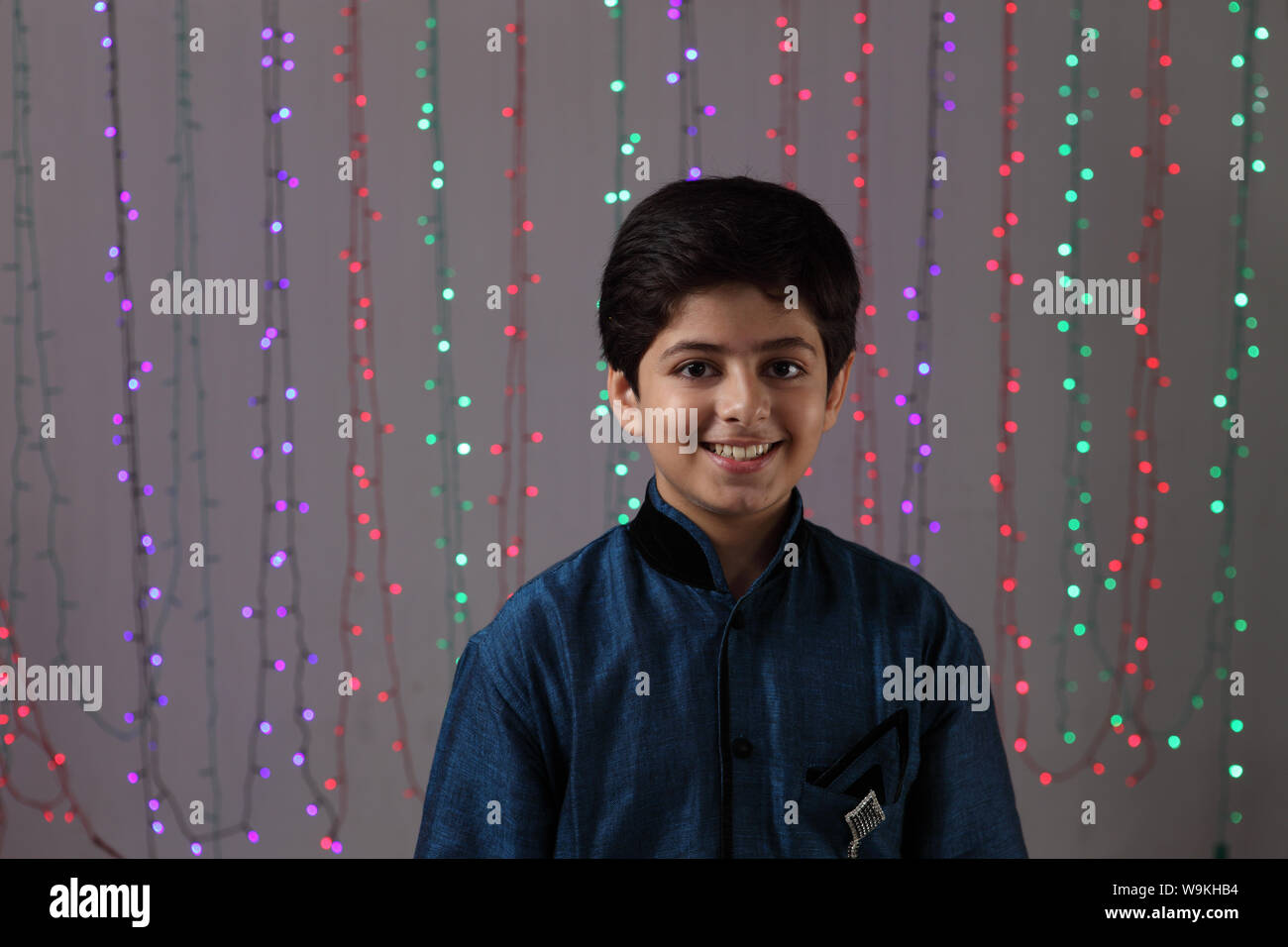 Boy celebrating Diwali and smiling Stock Photo - Alamy