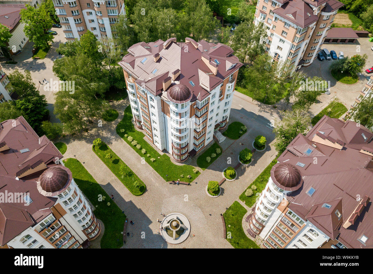 Top view of apartment or office tall buildings, parked cars, urban city ...