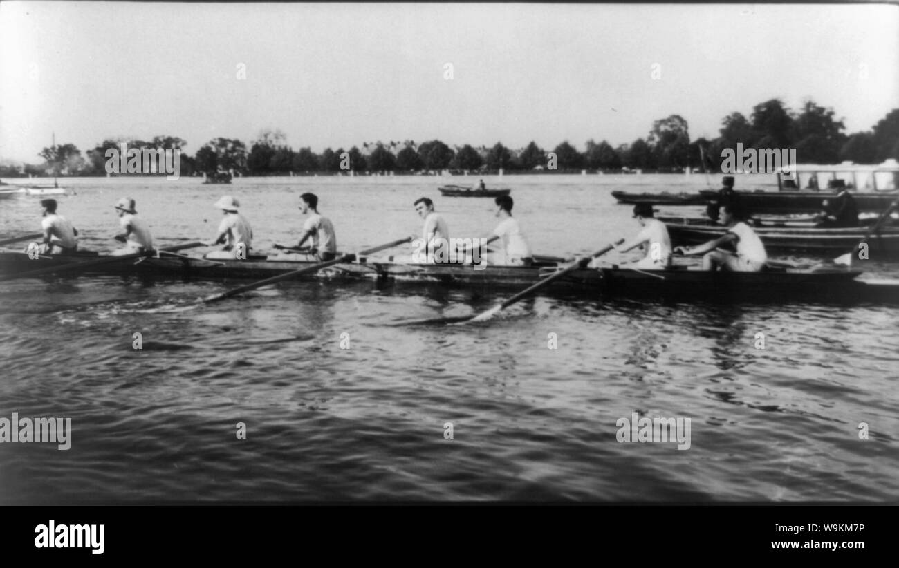 An eight-oared shell boat and crew--race between Harvard University and ...