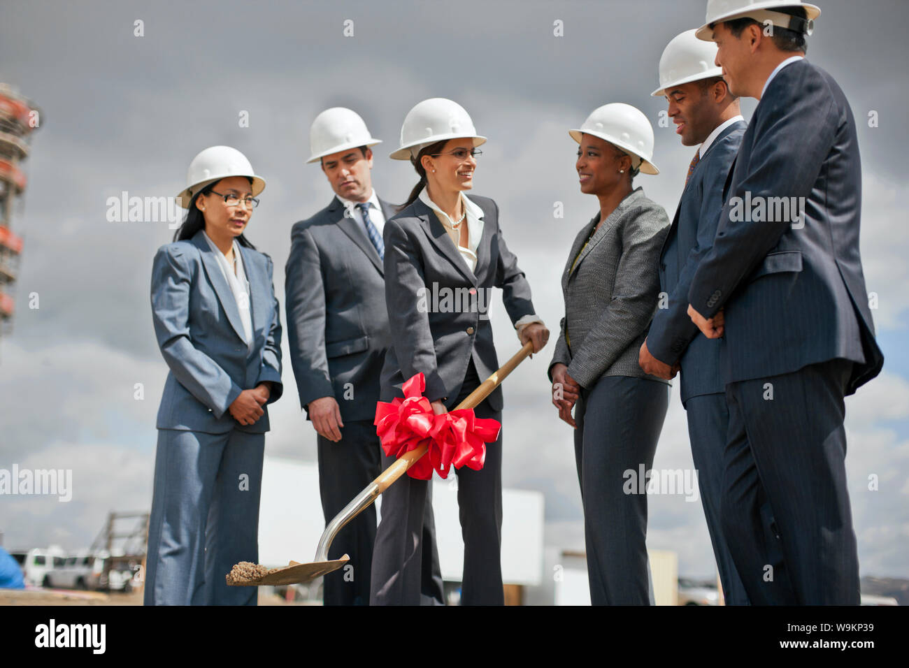 Group of business colleagues breaking ground on a project Stock Photo ...