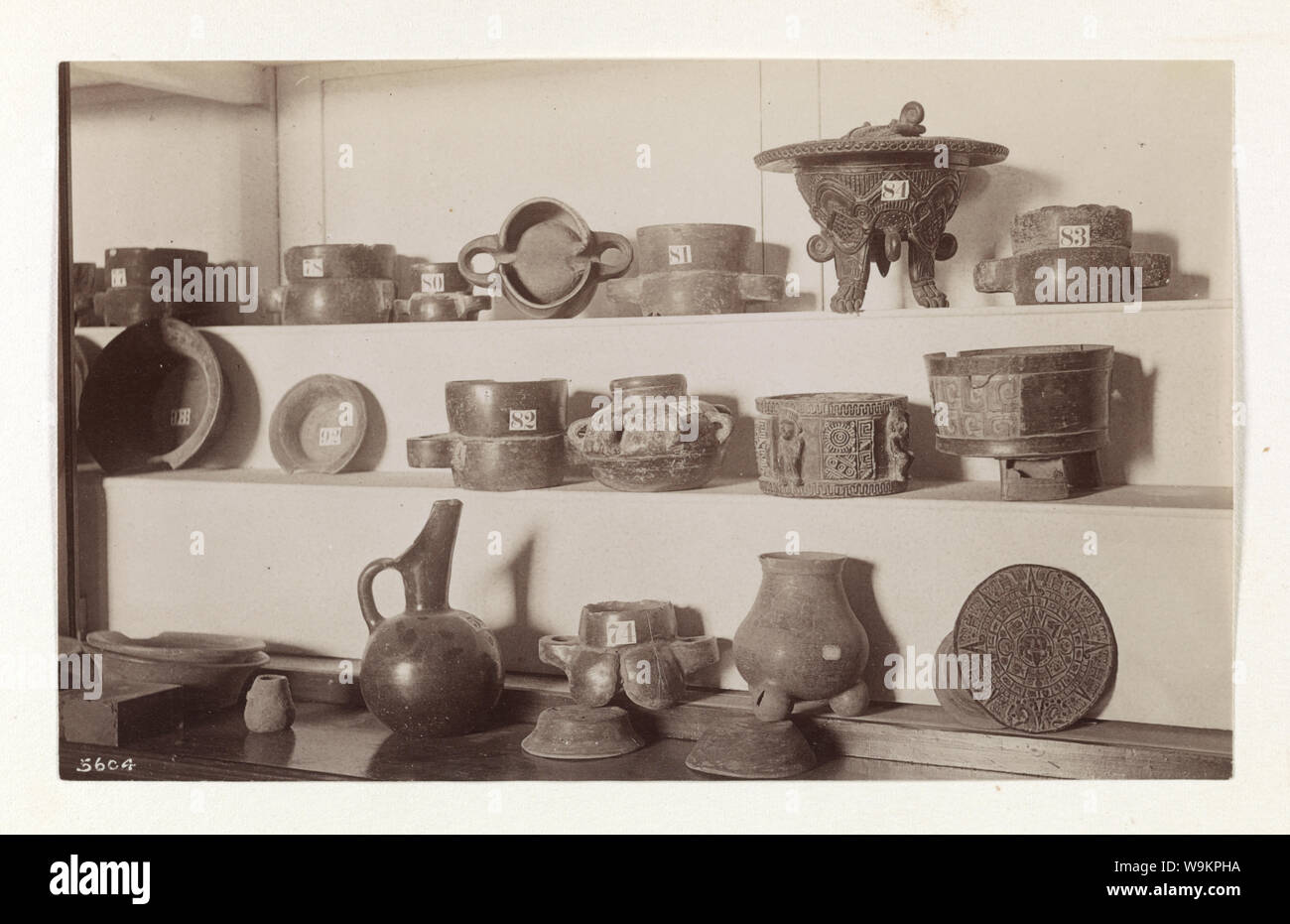 Ancient pottery and Aztec statue Stock Photo - Alamy