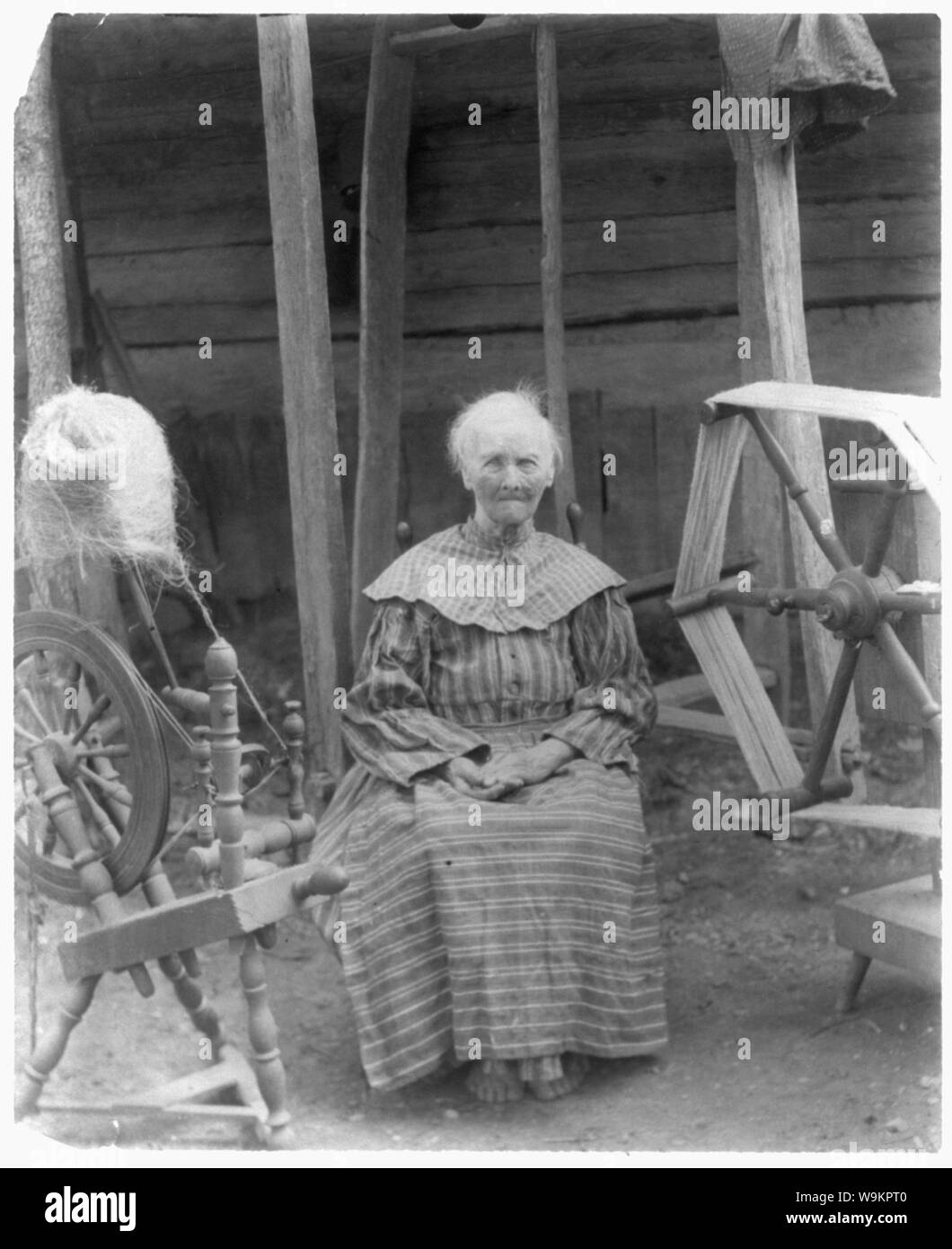 Anderson County, East Tennessee: Mrs. Mary Faust seated by spinning ...
