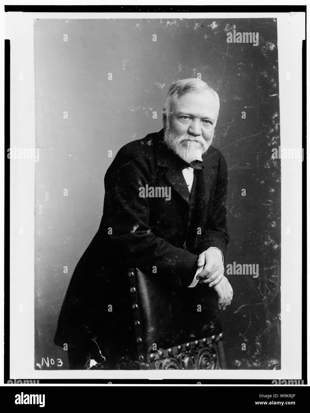 Andrew Carnegie, three-quarter length portrait, leaning on chair ...