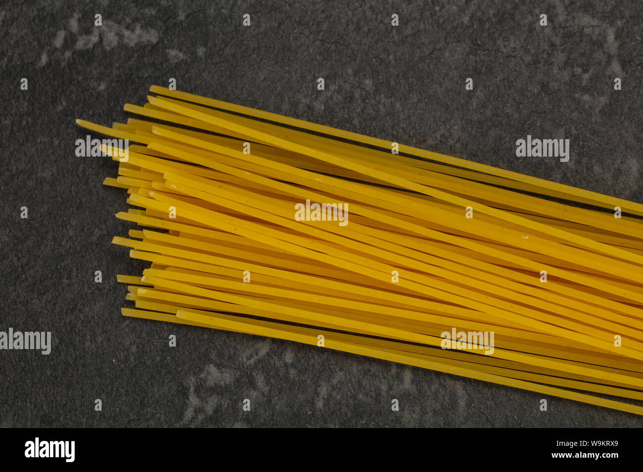 Dry raw spaghetti ready for bowling Stock Photo - Alamy