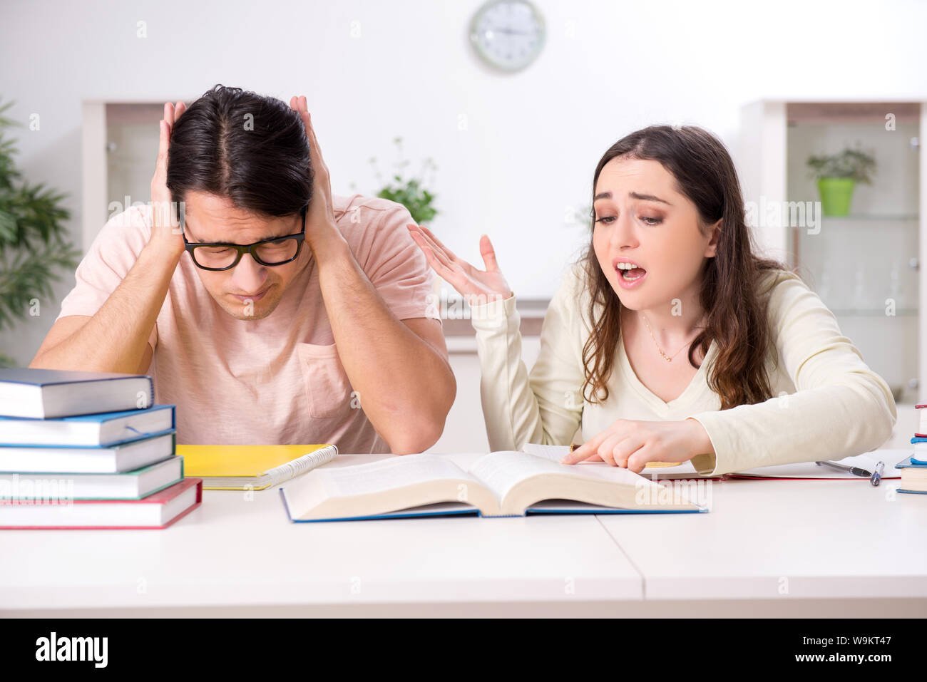 The students preparing for exam together at home Stock Photo - Alamy