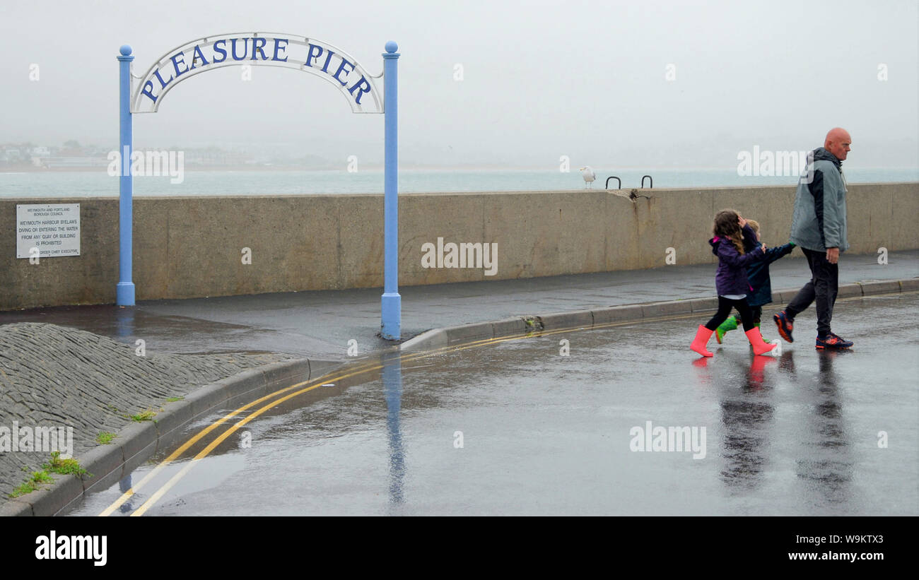 Weymouth, Dorset. 14th August 2019. UK Weather. It's even wet in ...
