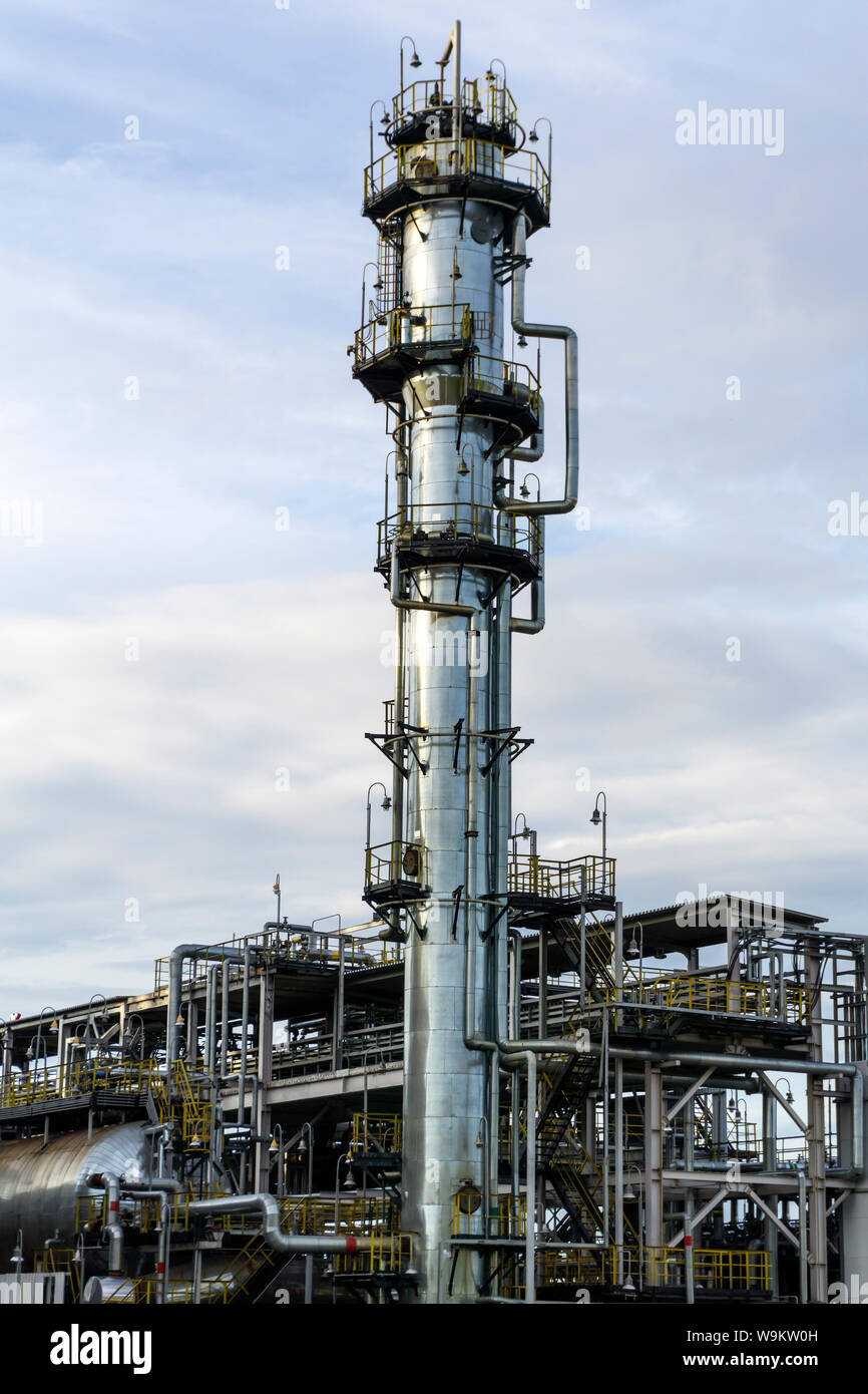 Fragment of a modern thermal cracking column against the sky Stock ...