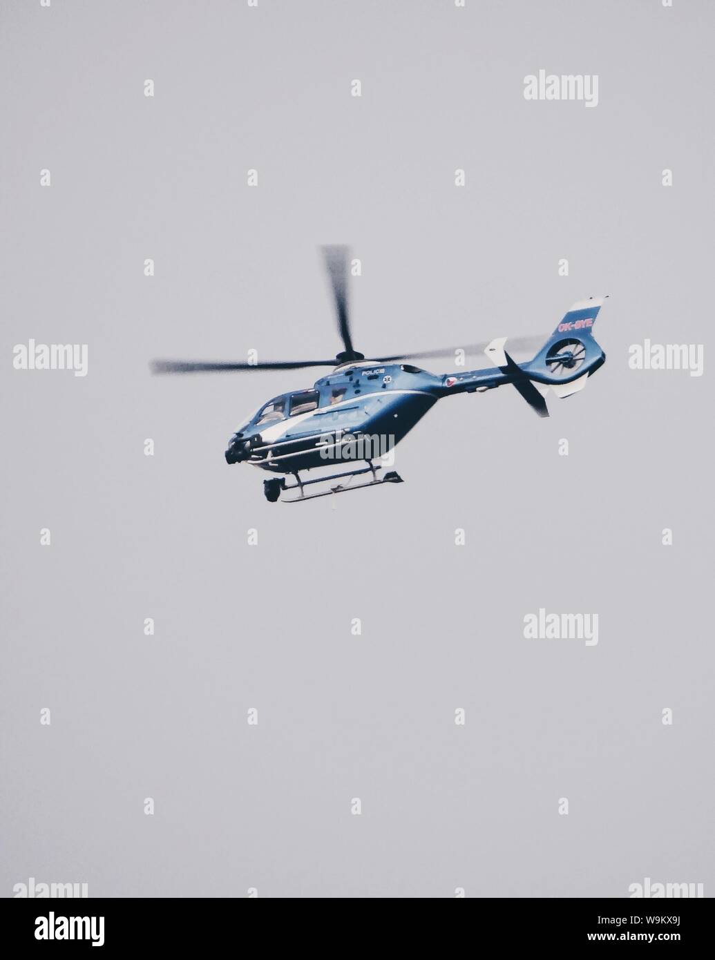 Journalist helicopter flying in the sky with a grey background Stock ...