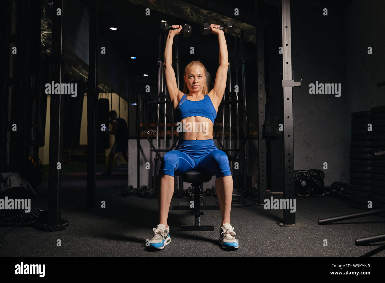 Female bodybuilder with arms raised hi-res stock photography and images ...