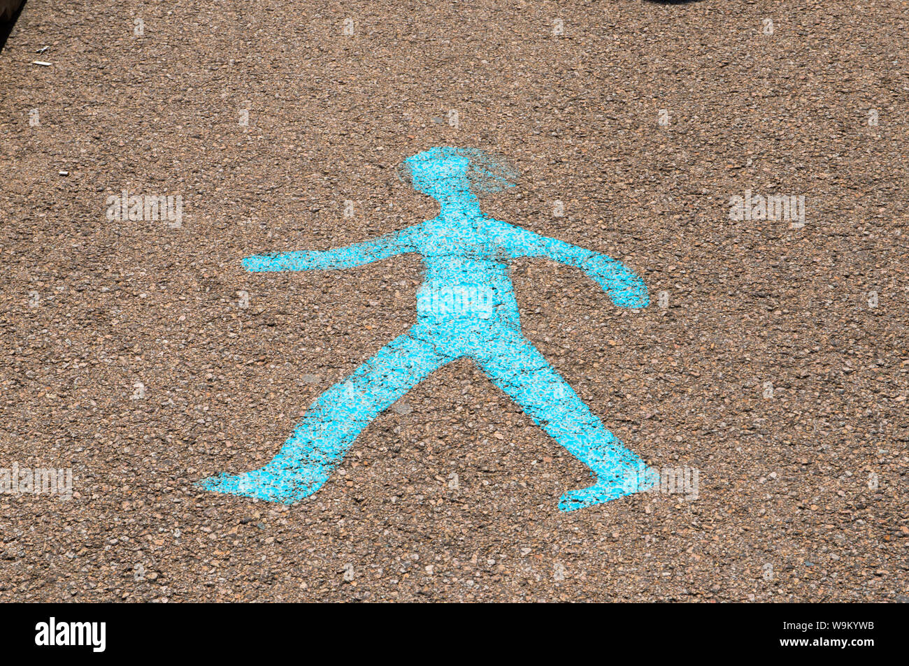 Pedestrian pathway in France with outlined blue person walking ...