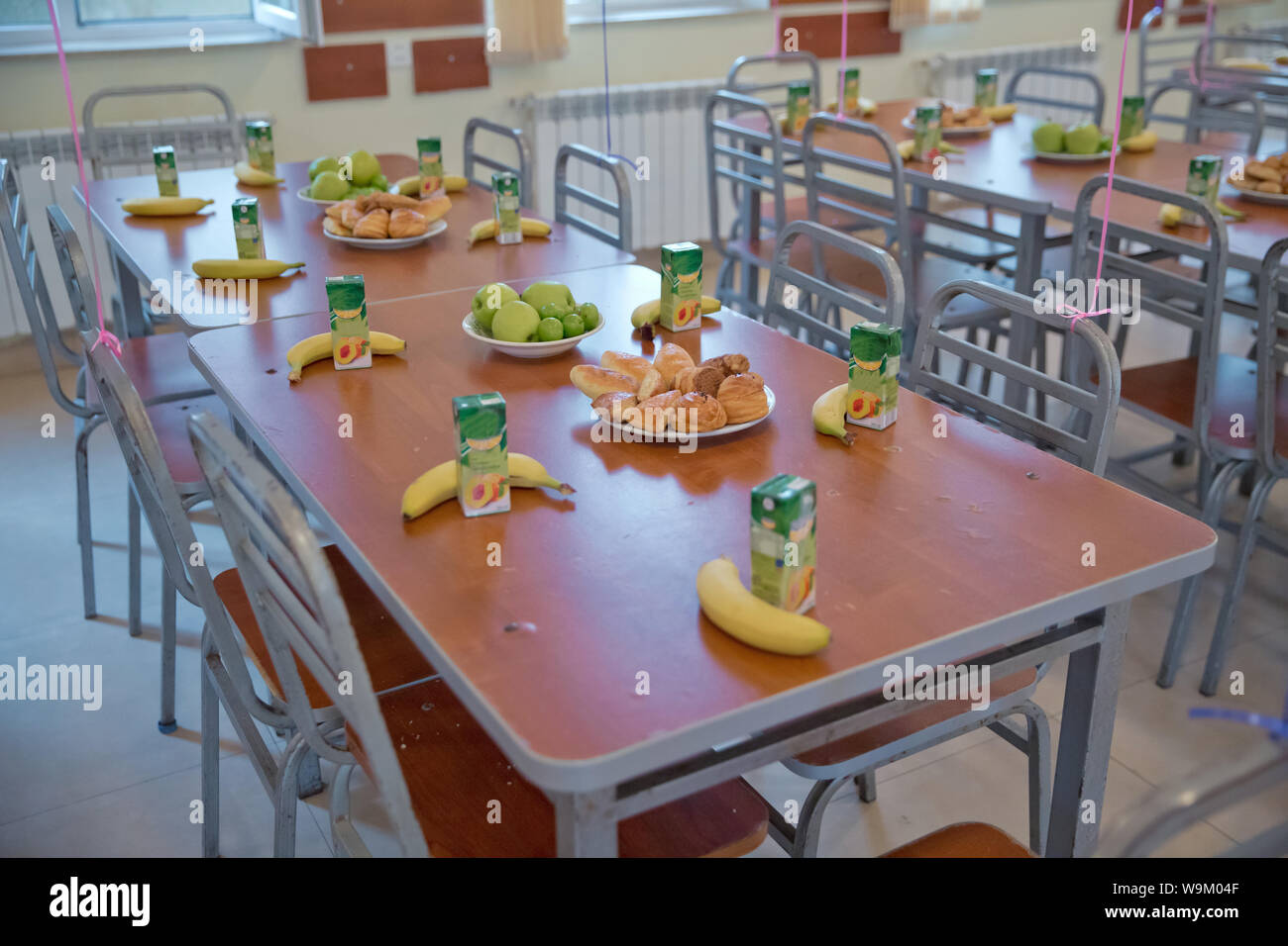 Food aid for orphans . kids eating lunch in a social school orphanage ...