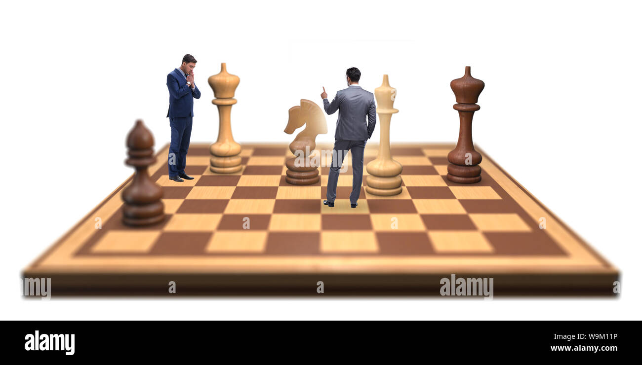 The businessman in large chess board in strategy concept Stock Photo ...