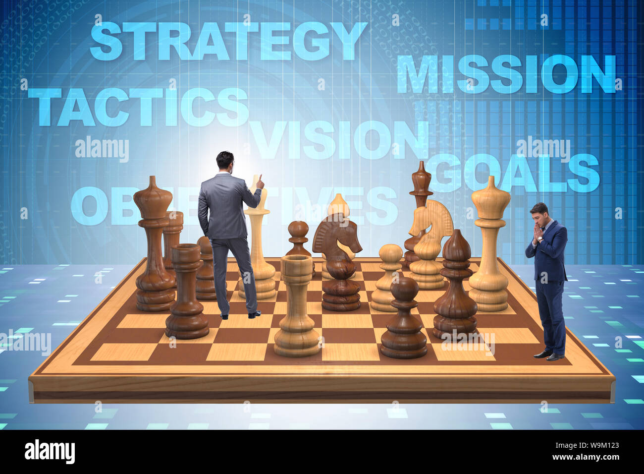 The businessman in large chess board in strategy concept Stock Photo ...