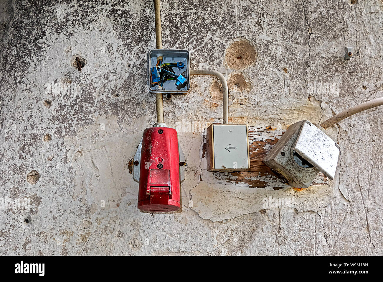 Broken electricity socket hi-res stock photography and images - Alamy