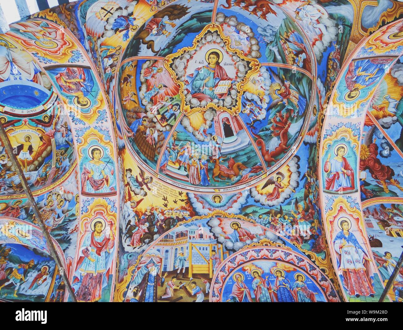 Closeup shot of Christian religious imagery on the ceiling of church ...
