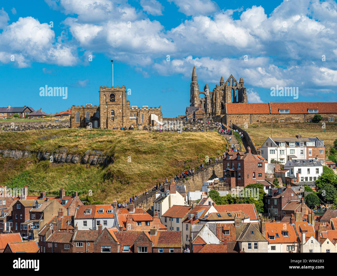 Whitby Abbey and St Mary's church with steps leading up from town ...
