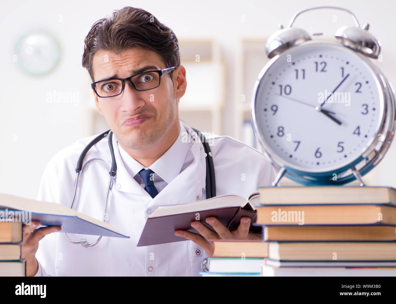 The medical student running out of time for exams Stock Photo - Alamy