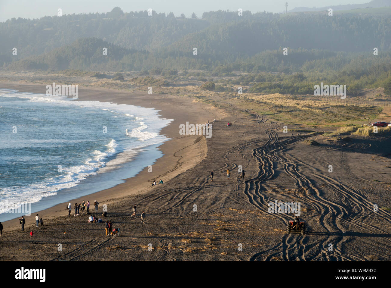 People on beach in winter at Buchupureo, Nuble, Chile Stock Photo - Alamy