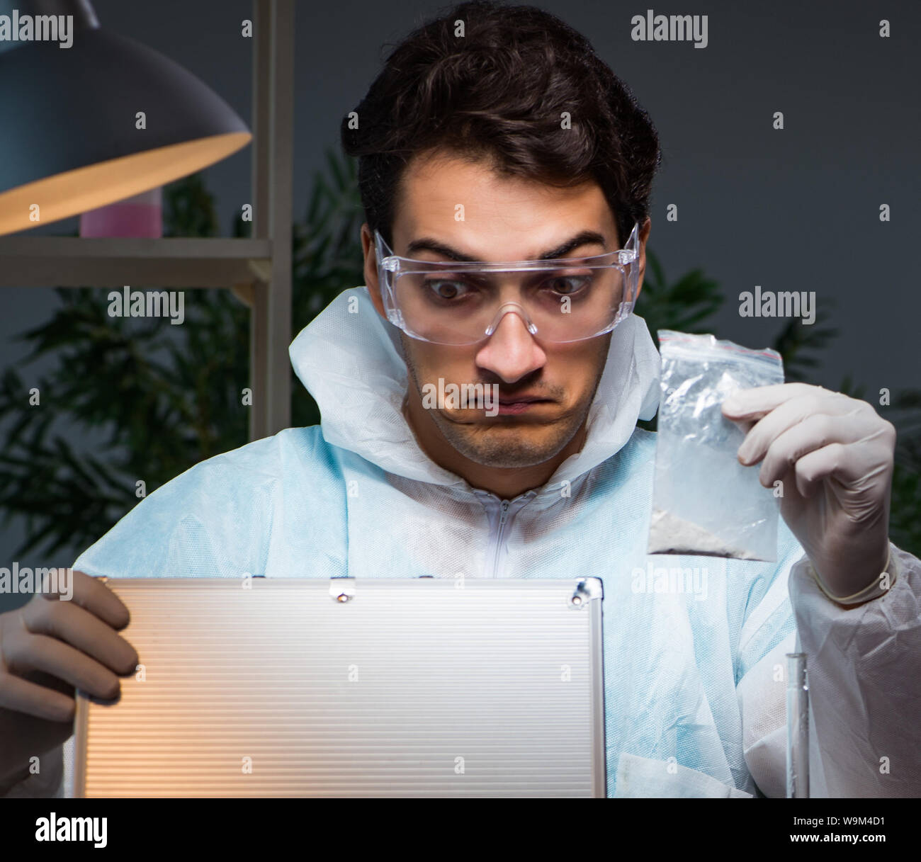 Forensic investigator collecting blood hi-res stock photography and ...