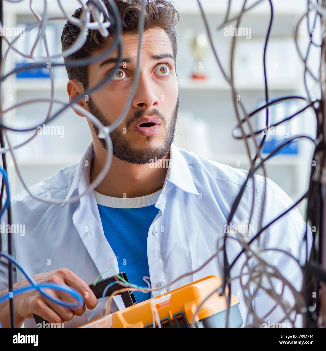 Untangle wires hi-res stock photography and images - Alamy