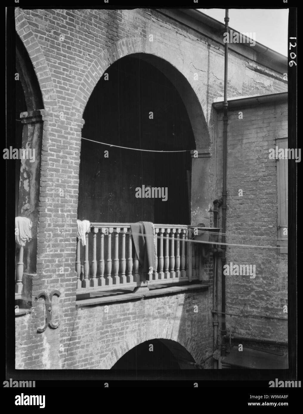 Arched balcony in a courtyard, New Orleans Stock Photo - Alamy