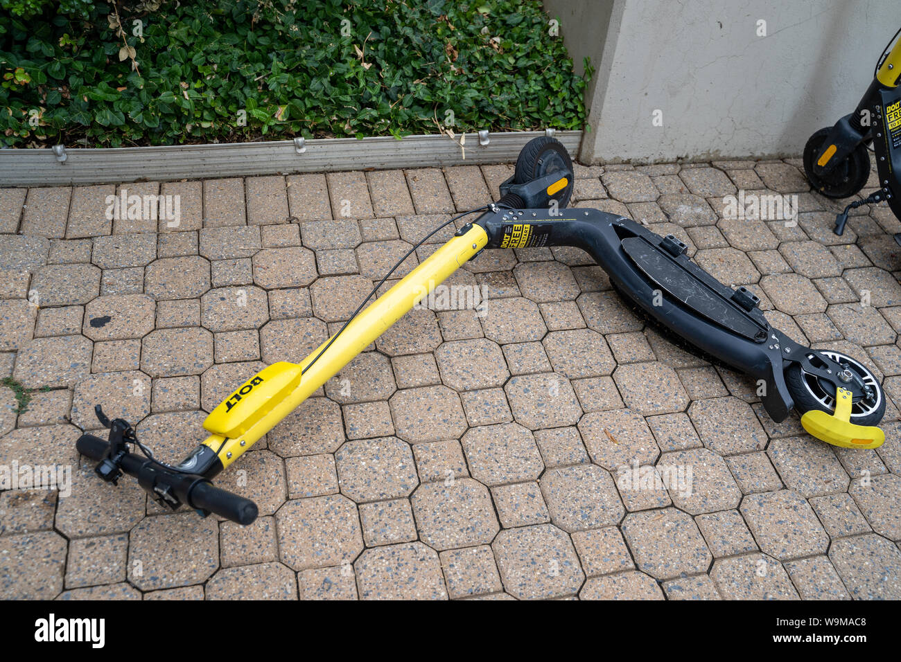 Electric scooters improperly parked hi-res stock photography and images ...