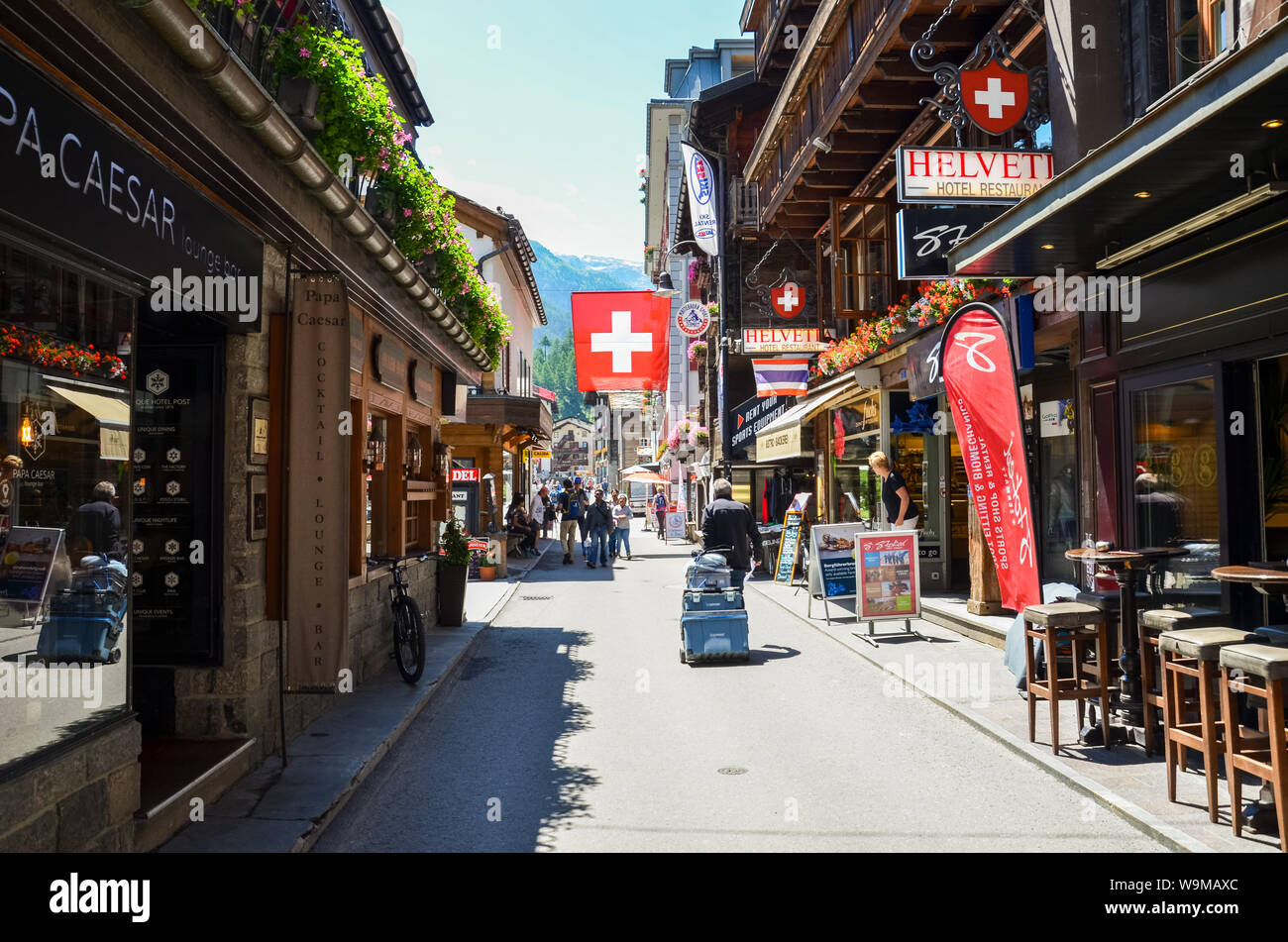Zermatt, Switzerland - July 10 2019: Street in Alpine resort Zermatt ...