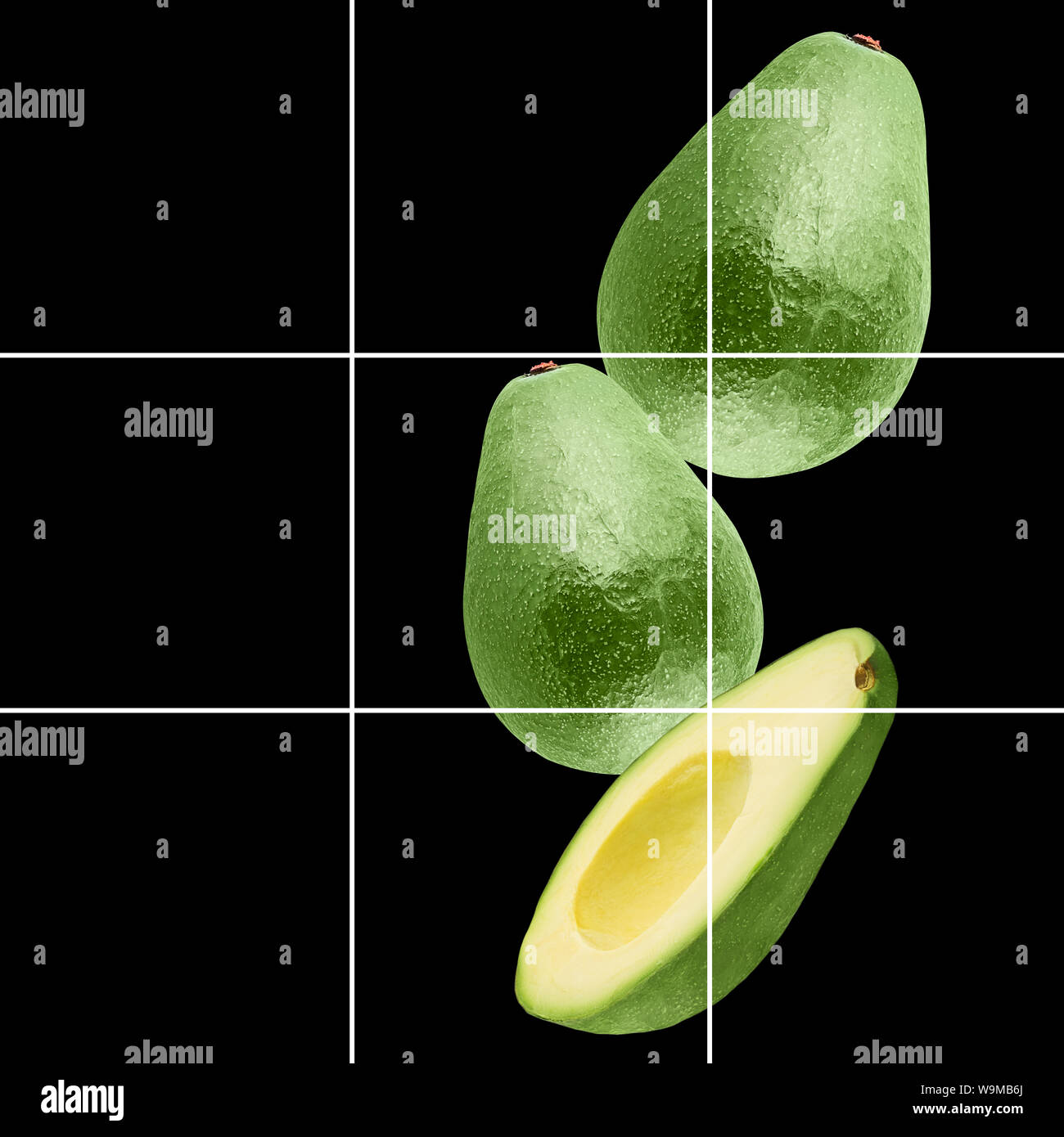 Falling avocado fruit isolated on black background Stock Photo - Alamy