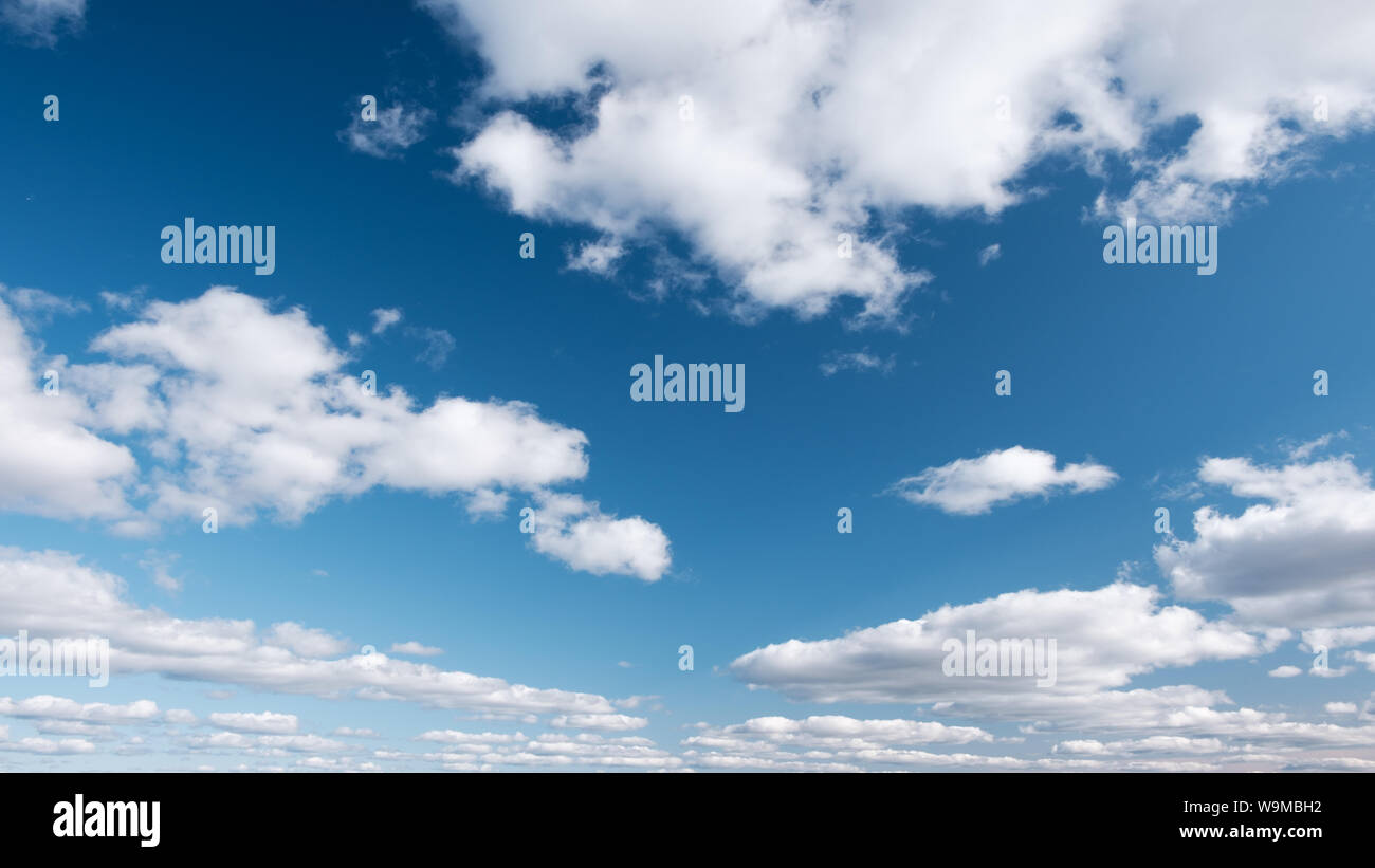 blue sky background with tiny clouds. panorama Stock Photo - Alamy