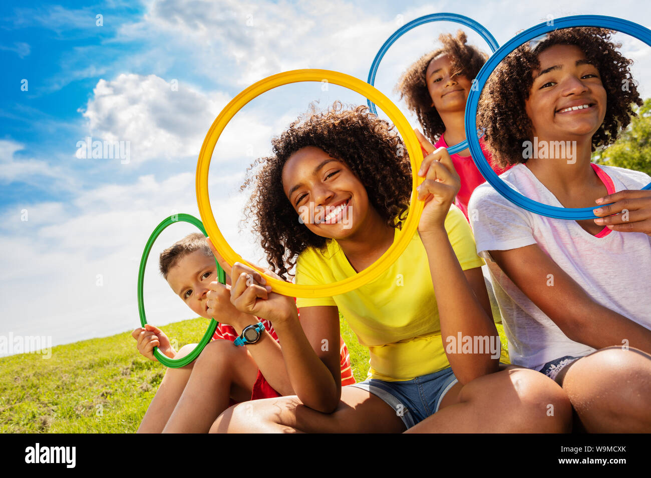 Hula hoop game children hi-res stock photography and images - Alamy