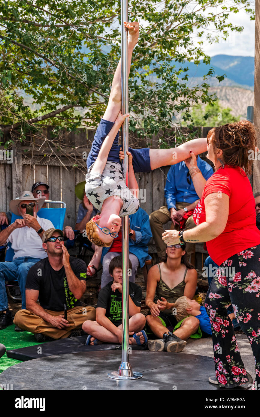 Child performing pole act; Salida Circus summer camp finale; Salida ...