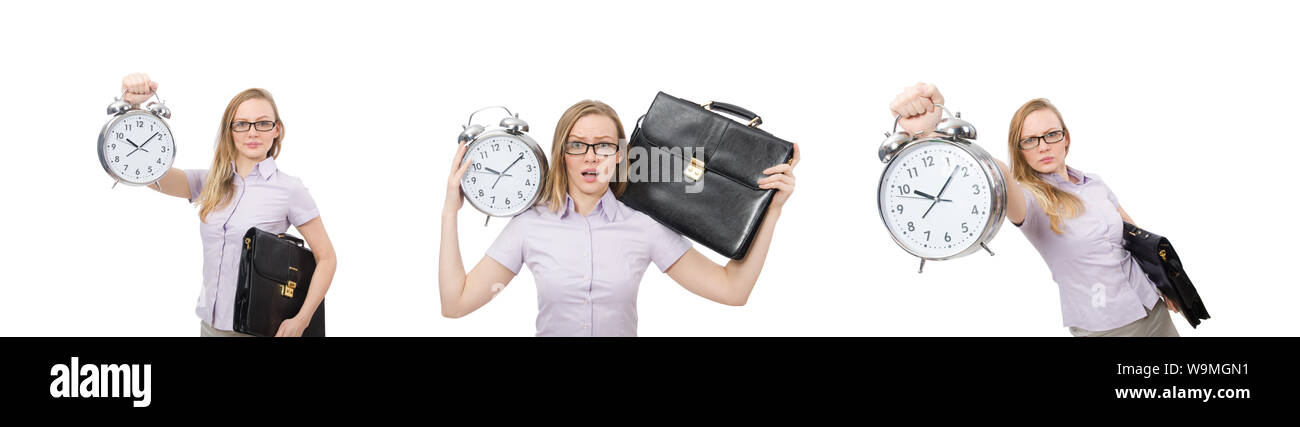 The young employee holding alarm clock isolated on white Stock Photo ...