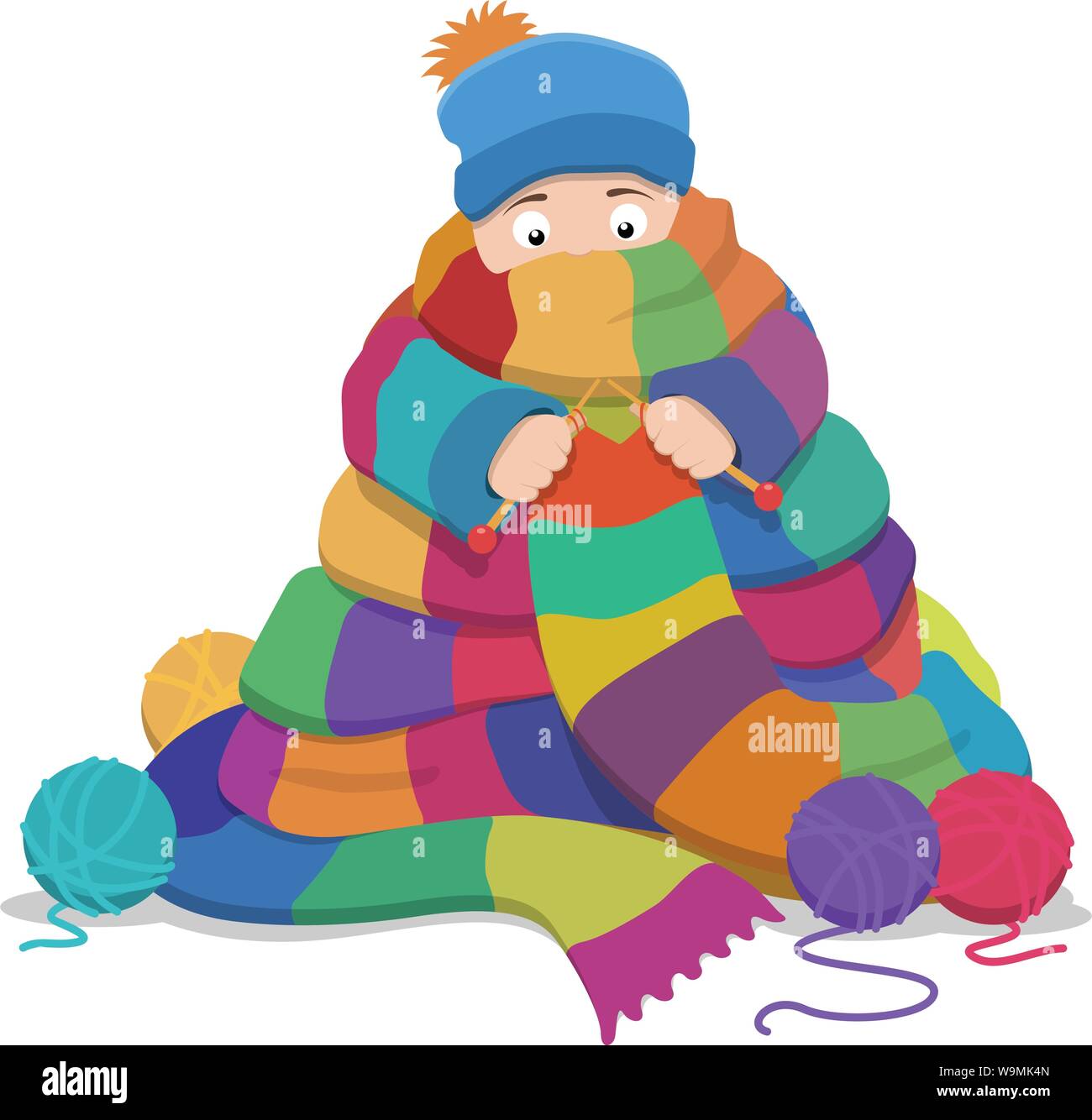 A person sat down knitting a huge, multi coloured scarf which is ...