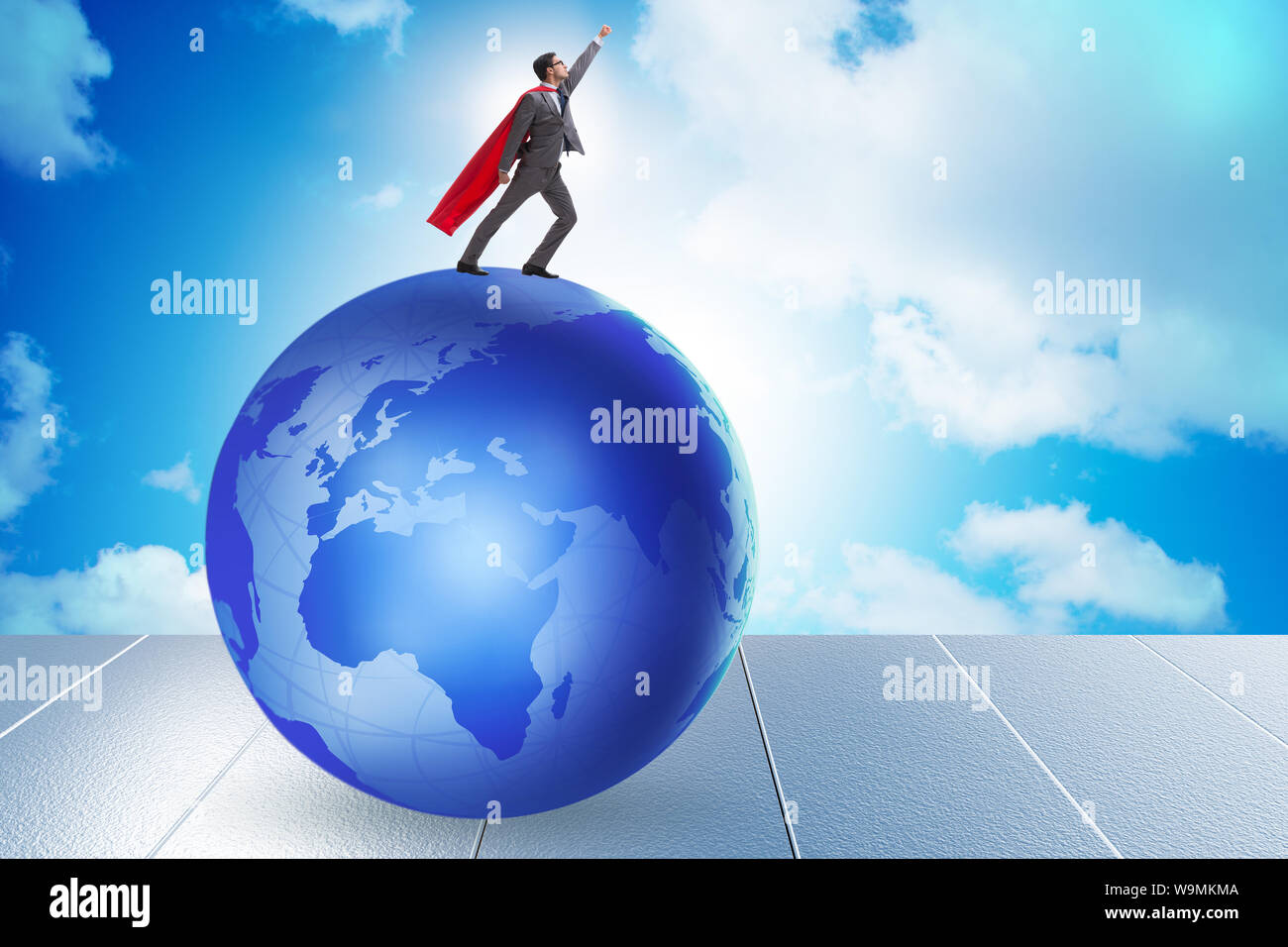The businessman on top of the world Stock Photo - Alamy