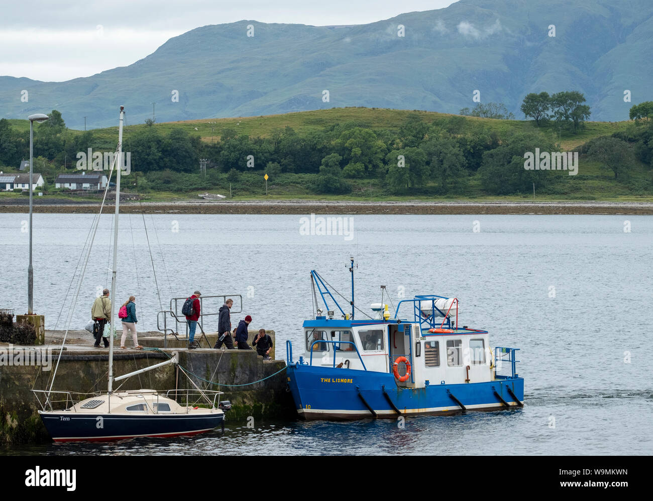 The Lismore passenger ferry prepares to depart from Port Appin pier on ...