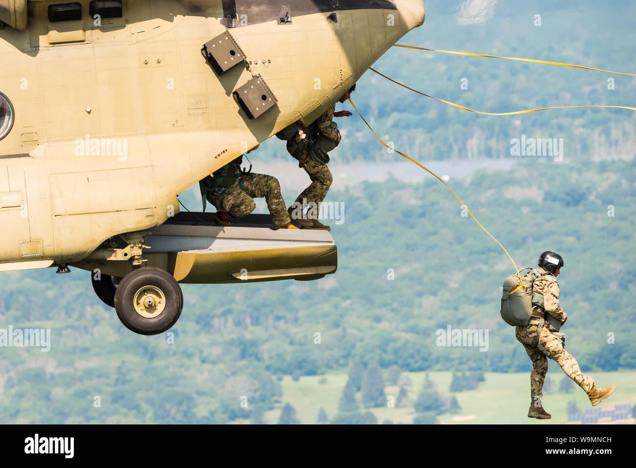 Soldier jumping out of a Chinook at 2019 Leapfest, an international ...