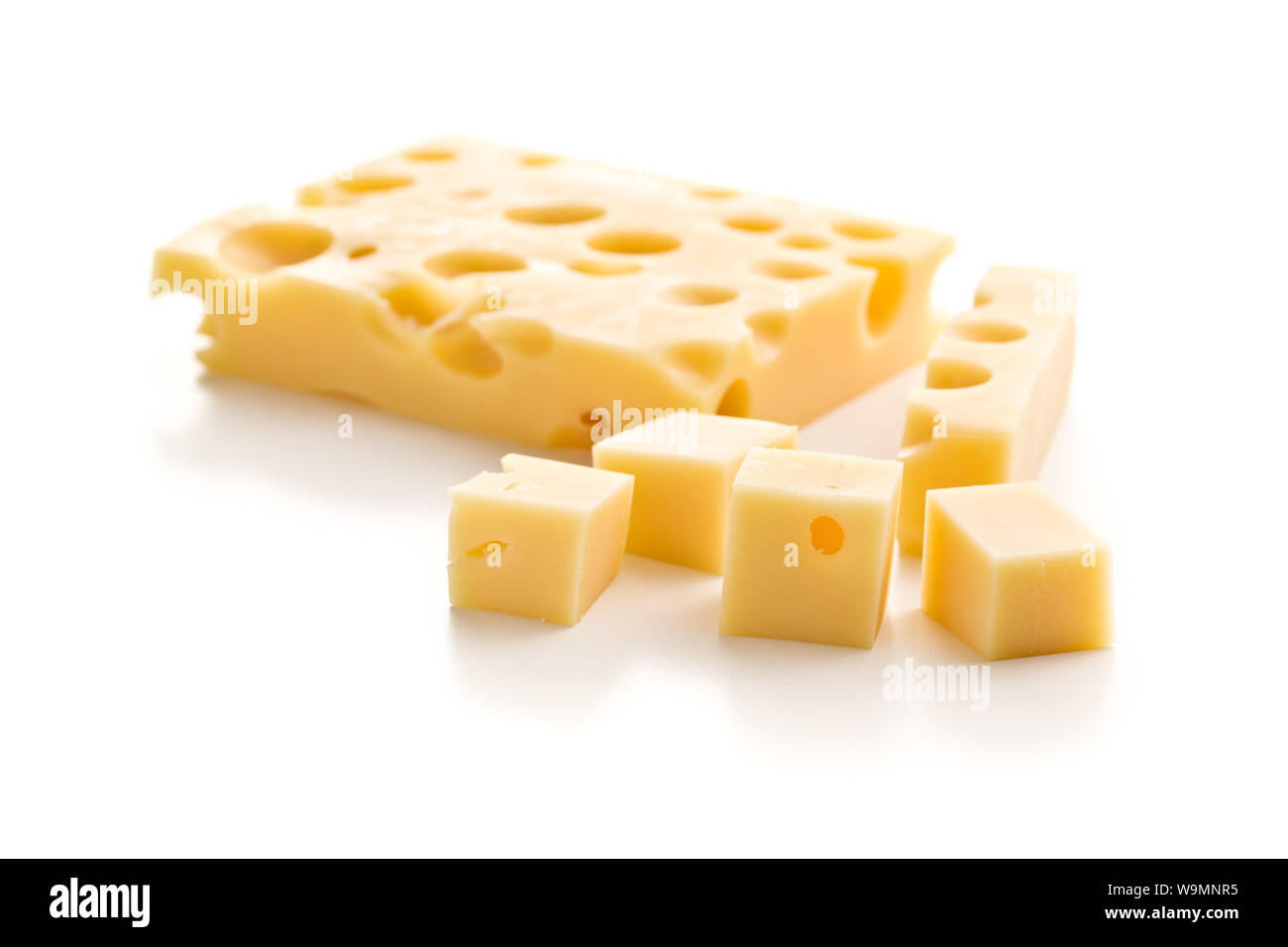 The cheese cubes isolated on white background Stock Photo - Alamy