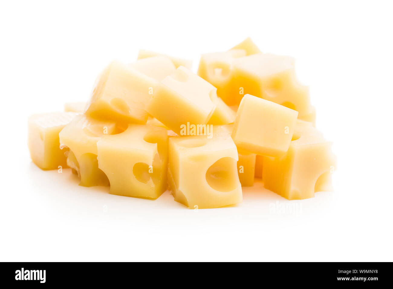 The cheese cubes isolated on white background Stock Photo - Alamy