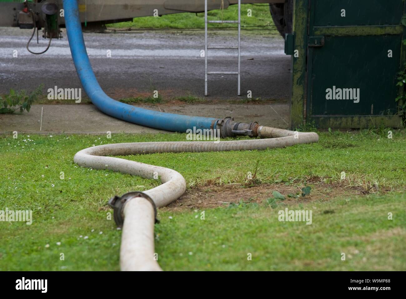 Septic tank: the removal of sewage sludge and cleaning of a domestic ...