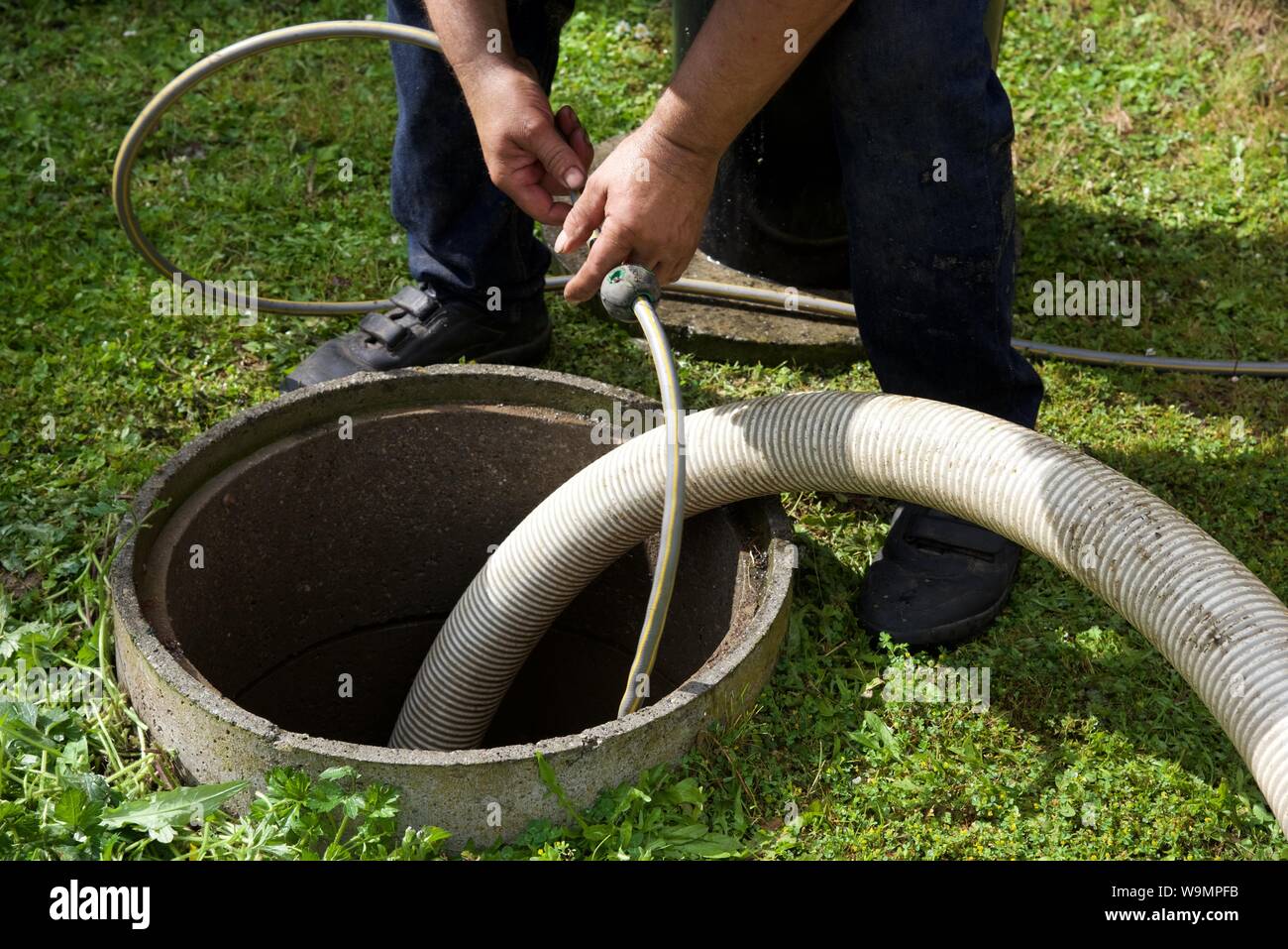 Septic tank: the removal of sewage sludge and cleaning of a domestic ...