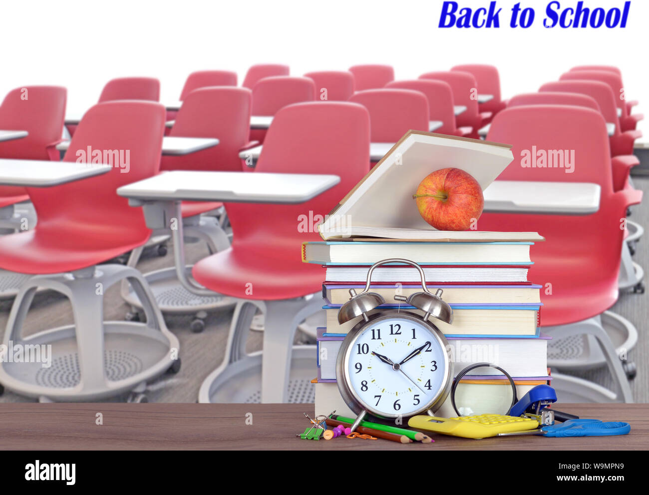 books and back to school concept in an empty classroom against white ...