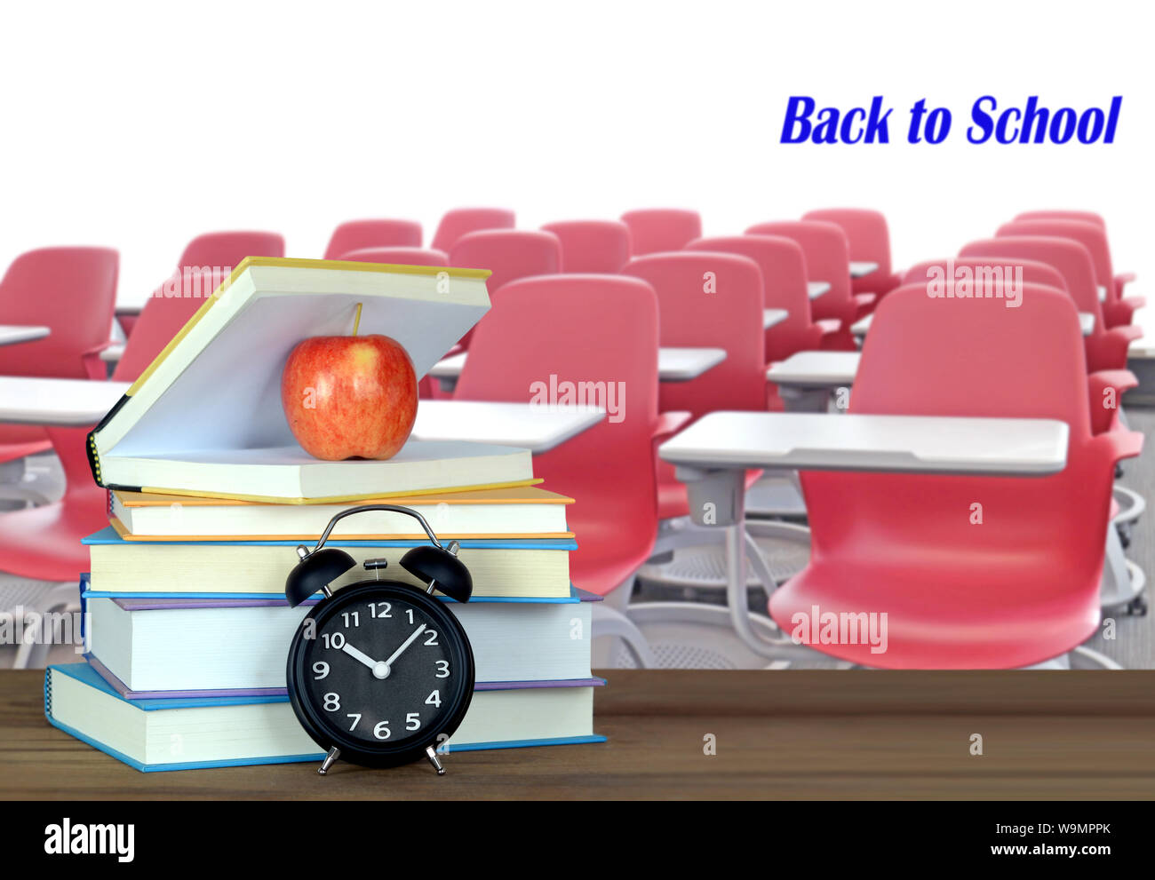 books and back to school concept in an empty classroom against white ...